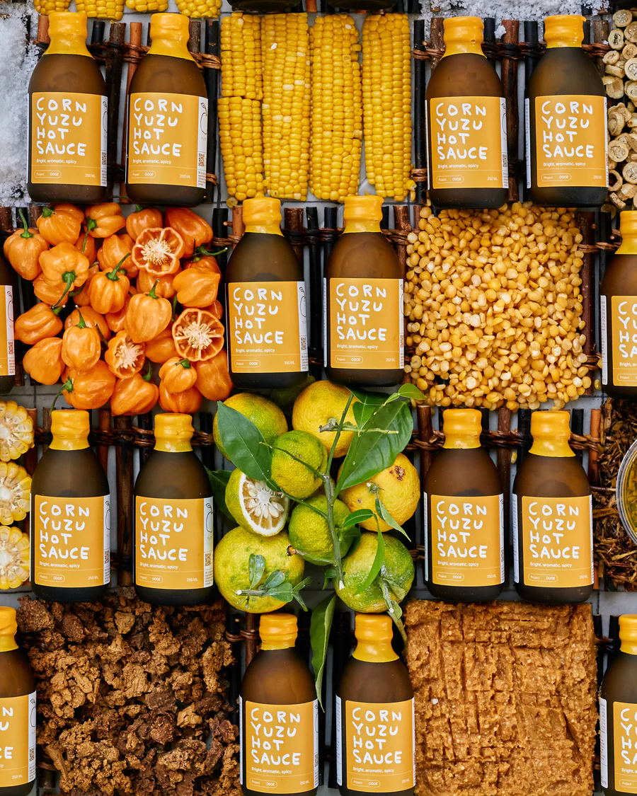 David Shrigley's Charm Is Infused Within Noma Projects' New Corn Yuzu Hot Sauce Packaging - DIELINE